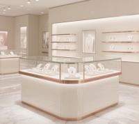 China Luxury Island Jewelry Display Counter Rounded Corner Cream Rose Gold Glass Showcase With LED for Retail Shop for sale