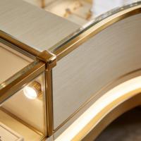 China Luxury Curved Jewelry Display Cabinet LED | Cream Color Solid Wood Gold Metal Frame | Middle Island Counter High-End Jewelry for sale
