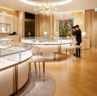 China Luxury Cream & Gold Circular Jewelry Store Interior Design, Turnkey Retail Solution with Ring-Shaped Display Counter for sale
