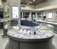 China Modern Grey Wood Jewelry Store Interior Design, Complete Turnkey Fixture Package with Curved Central Showcase for sale