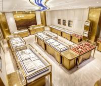 China Luxury Champagne Gold Curved Jewelry Display Case, Premium Glass Showcase with LED Lighting for High-End Jewelry Boutiques for sale
