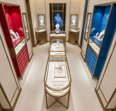China Luxury Red/Blue & Gold Jewelry Island Display Counter, Premium Curved Glass Showcase for High-End Jewelry Retail for sale