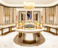 China Luxury Gold Frame Round Gold Jewelry Display Island, Premium Glass Jewelry Showcase for High-End Jewelry Stores for sale
