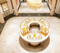 China Luxury Gold Frame Round Gold Jewelry Display Island, Premium Glass Jewelry Showcase for High-End Jewelry Stores for sale