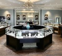 China Luxury Octagonal Ring-Shaped Jewelry Display Island, Premium Glass Showcase for High-End Jewelry Stores for sale