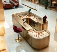 China Luxury Champagne Gold Curved Jewelry Island Service Counter Display Cabinet, High-End Glass Showcase for Fine Jewelry Retail for sale