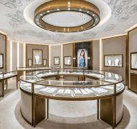 China Custom Luxury Round Jewelry Display Counter, Premium Gold Stainless Steel & Glass Showcase for High-End Jewelry Boutique for sale