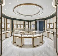 China Custom Luxury Round Jewelry Display Counter, Premium Gold Stainless Steel & Glass Showcase for High-End Jewelry Boutique for sale