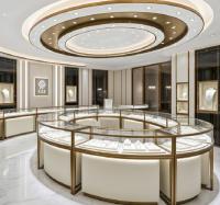 China Custom Luxury Round Jewelry Display Counter, Premium Gold Stainless Steel & Glass Showcase for High-End Jewelry Boutique for sale