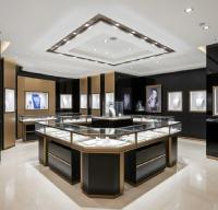 China Custom Luxury Square Jewelry Display Counter, Premium Gold & Black Stainless Steel Glass Showcase for High-End Jewelry Boutique for sale