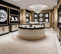 China Luxury Jewelry Island Display Counter Custom Beige Black Showcase Gold Trim Crystal Chandelier Style LED Lighting Showroom for sale