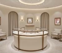 China Elegant Round LED Lit Metal Jewelry Display Case Cream Base Gold Frame Glass Top for Luxury Mall Retail for sale