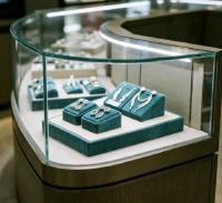 China Luxury Curved Island Jewelry Display Case, Glass Showcase with Velvet Trays for sale