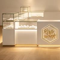China Custom Luxury Perfume Display Cabinets with LED Lighting for Boutique Fragrance Shops Interior Design for sale