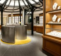 China Premium Jewelry Pop-Up Store Design Curved Stainless Steel LED Lit High Quality Display Brand Feature Wall Backlit Glass Malls for sale