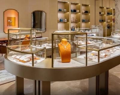 China Luxury Warm Tone LED Lighting Jewelry Display Cases High End Custom Glass Showcases with Gold Trim for Pearl Jewelry Store for sale