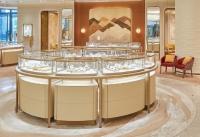 China Luxury Warm Tone LED Lighting Jewelry Display Cases High End Custom Glass Showcases with Gold Trim for Pearl Jewelry Store for sale