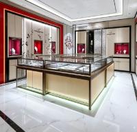 China Custom Luxury Jewelry Store New Chinese Red & Gold Glass Island Display Cabinet for sale
