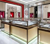 China Custom Luxury Jewelry Store New Chinese Red & Gold Glass Island Display Cabinet for sale