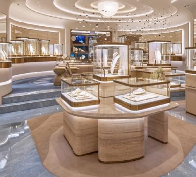 China Custom Luxury Jewelry Store Island Display Cabinet, Gold Trim Glass Jewelry Showcase for sale