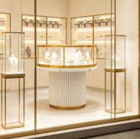 China Hot Custom Luxury LED Glass Jewelry Display Stand with Modern Design for Retail Store and Jewelry Showroom for sale
