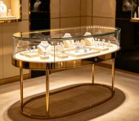 China Custom Oval Luxury Jewelry Showroom Display Cabinet Stand Gold Diamonds Display Counter Jewelry Exhibition Showcase for sale