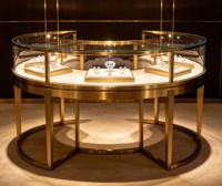 China Custom Oval Luxury Jewelry Showroom Display Cabinet Stand Gold Diamonds Display Counter Jewelry Exhibition Showcase for sale