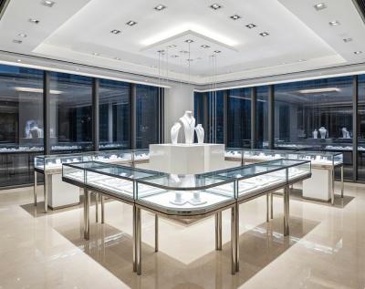 China Freestanding Iron Frame Jewelry Display Counter with Premium Glass LED Lighting Customizable Design for Luxury Shopping Malls for sale