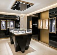 China Custom Luxury Geometric Jewelry Display Counter Premium Black Gold Stainless Steel Glass Showcase High-End Jewelry Boutique Mall for sale