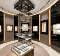 China Custom Luxury Geometric Jewelry Display Counter Premium Black Gold Stainless Steel Glass Showcase High-End Jewelry Boutique Mall for sale