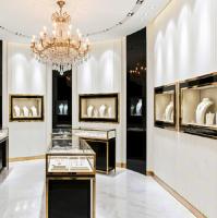 China Modern LED Lit Jewelry Display Counter White & Gold Glass Showcase for Luxury Jewelry Retail in Shopping Malls for sale