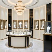 China Modern LED Lit Jewelry Display Counter White & Gold Glass Showcase for Luxury Jewelry Retail in Shopping Malls for sale