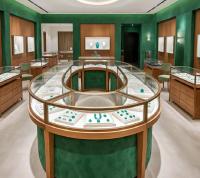 China Elegant Circular Jewelry Display Counter Solid Wood Frame Green Velvet Base Tempered Glass Showcase LED Lighting Luxury Mall for sale