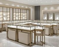 China Modern Luxury Jewelry Display Counter Set with Gold Trim Tempered Glass Showcase and LED Lighting for Mall Use for sale