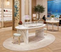 China Luxury Curved Jewelry Display Table | Calacatta Marble Base Aluminium Metal Frame | Oval Glass Showcase Built-in LED Showroom for sale