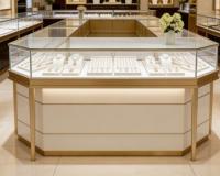 China High-End Custom L-Shaped Jewelry Island Counter Premium White Lacquer Gold Plated Metal Glass Showcase LED Lighting Durable Easy for sale