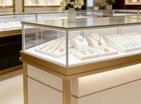 China High-End Custom L-Shaped Jewelry Island Counter Premium White Lacquer Gold Plated Metal Glass Showcase LED Lighting Durable Easy for sale