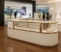 China Luxury U-Shaped Aluminium Jewelry Display Cabinet | Cream Color Gold Metal Frame | Modular Island Counter Retail Store Mall for sale