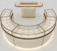 China Curved Jewelry Display Counter Reception Desk | Cream Color Gold Metal Edging | Semi-Circular Middle Island Counter Set Showroom for sale