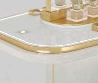 China Curved Jewelry Display Counter Reception Desk | Cream Color Gold Metal Edging | Semi-Circular Middle Island Counter Set Showroom for sale