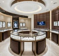China High-End Luxury Jewelry Island Kiosk, Custom Bronze Frame & Tufted Leather Tempered Glass Showcase for Luxury Jewelry Store for sale