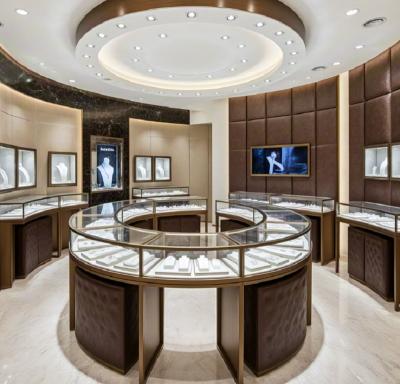 China High-End Luxury Jewelry Island Kiosk, Custom Bronze Frame & Tufted Leather Tempered Glass Showcase for Luxury Jewelry Store for sale