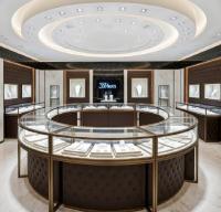 China High-End Luxury Jewelry Island Kiosk, Custom Bronze Frame & Tufted Leather Tempered Glass Showcase for Luxury Jewelry Store for sale
