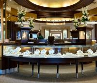 China Luxury Curved Jewelry Display Island, Premium Glass Jewelry Showcase for High-End Jewelry Stores for sale