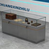 China Luxury Wooden Jewelry and Antique Display Cabinets with LED Strip Lighting, Eco-friendly and Durable, Available in Custom Sizes for sale