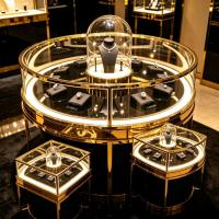 China Luxurious Round Gold High-end Jewelry Display Case, a Lavish Central Display Cabinet Featuring LED Lighting and a Glass Top for sale