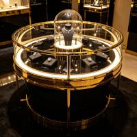 China Luxurious Round Gold High-end Jewelry Display Case, a Lavish Central Display Cabinet Featuring LED Lighting and a Glass Top for sale