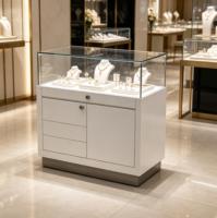 China Minimalist White Jewelry Display Case with Storage Cabinet Glass Display Case Commercial Jewelry, Gold, and Jade Display Counter for sale