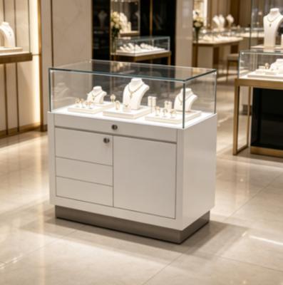 China Minimalist White Jewelry Display Case with Storage Cabinet Glass Display Case Commercial Jewelry, Gold, and Jade Display Counter for sale