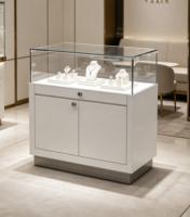 China Minimalist White Jewelry Display Case with Storage Cabinet Glass Display Case Commercial Jewelry, Gold, and Jade Display Counter for sale
